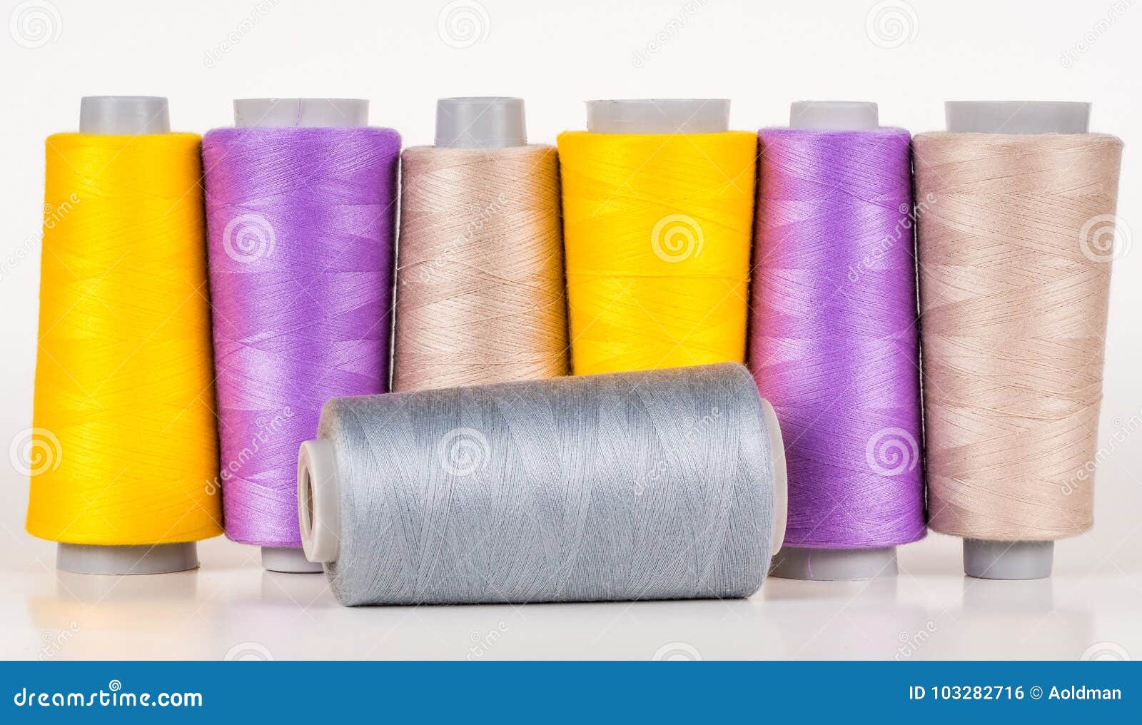 Vary colored thread coils stock photo. Image of mechanical - 103282716