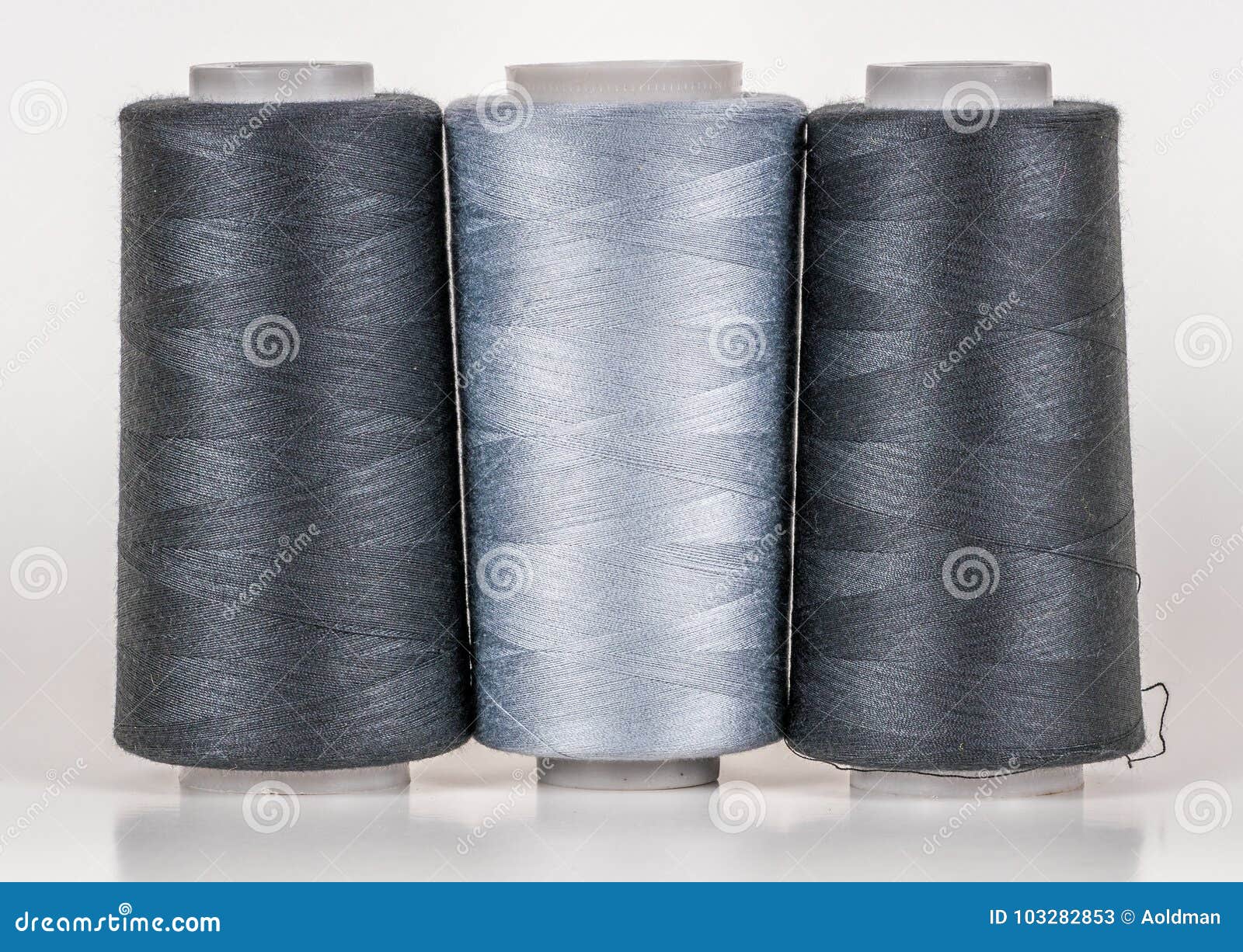Vary colored thread coils stock image. Image of black - 103282853