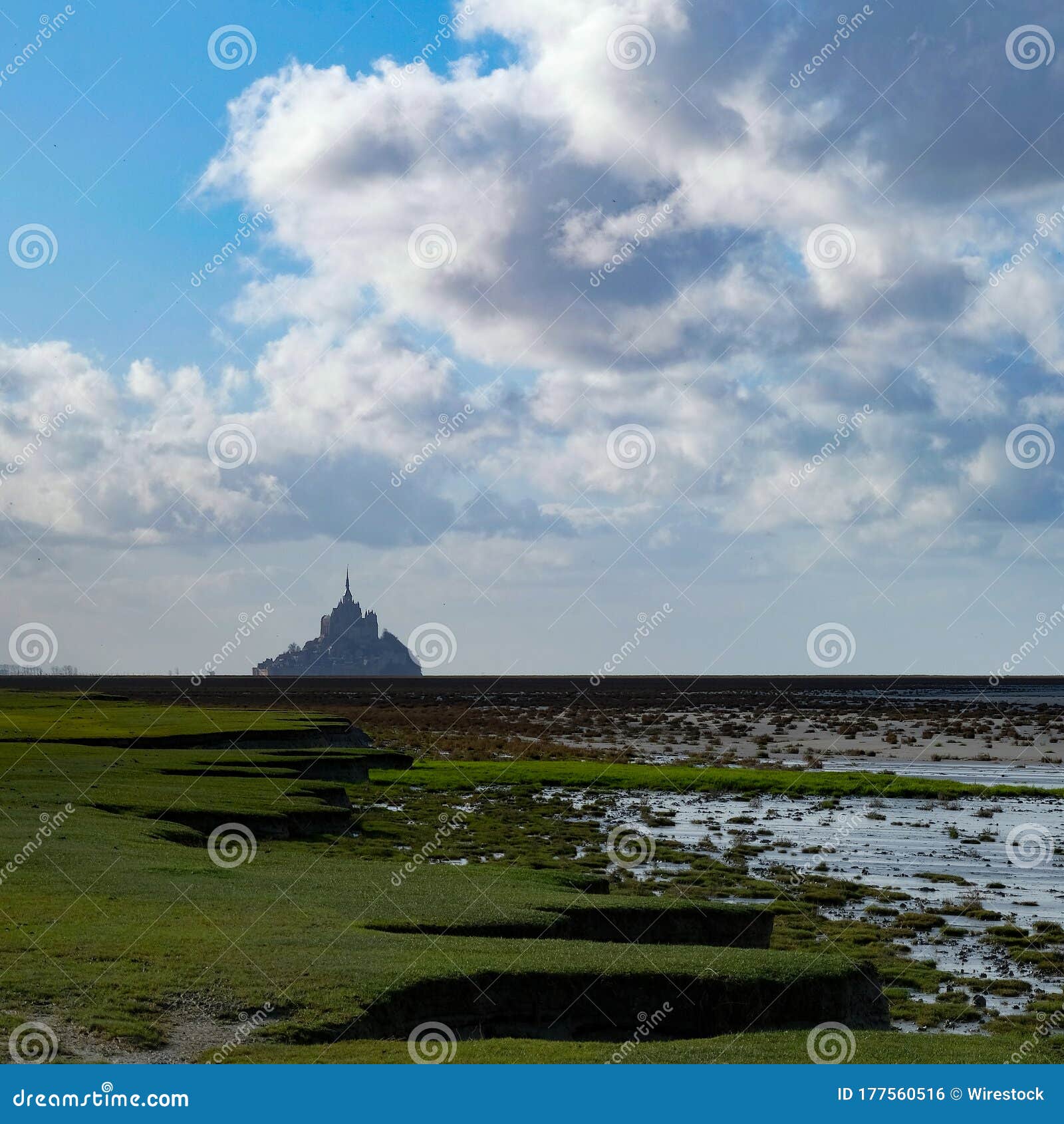 Vast Area of Green Land and Water in Front of a Building Stock Photo ...