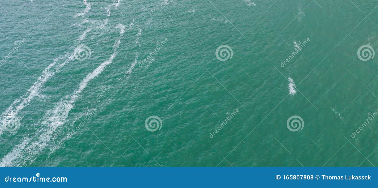 Vast Blue Ocean Background with Moderate Waves Looking Straight Down ...