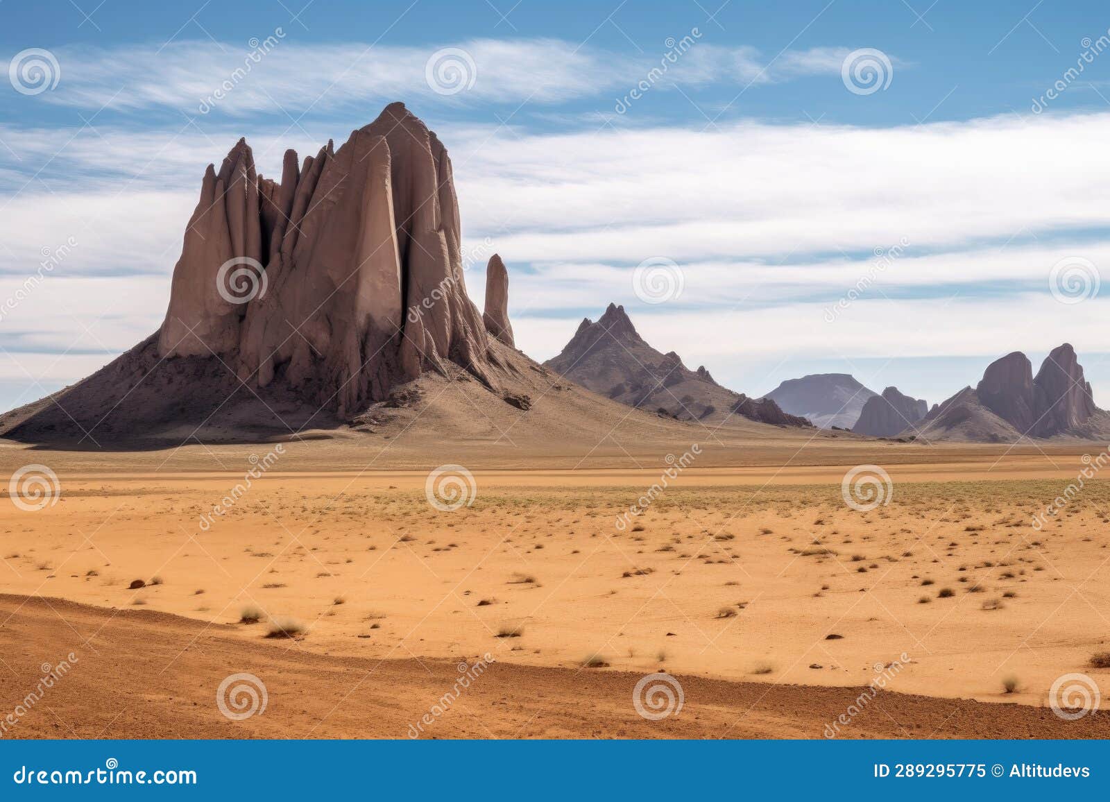 Vast Desert Landscape with Towering Rock Formations Stock Image - Image ...