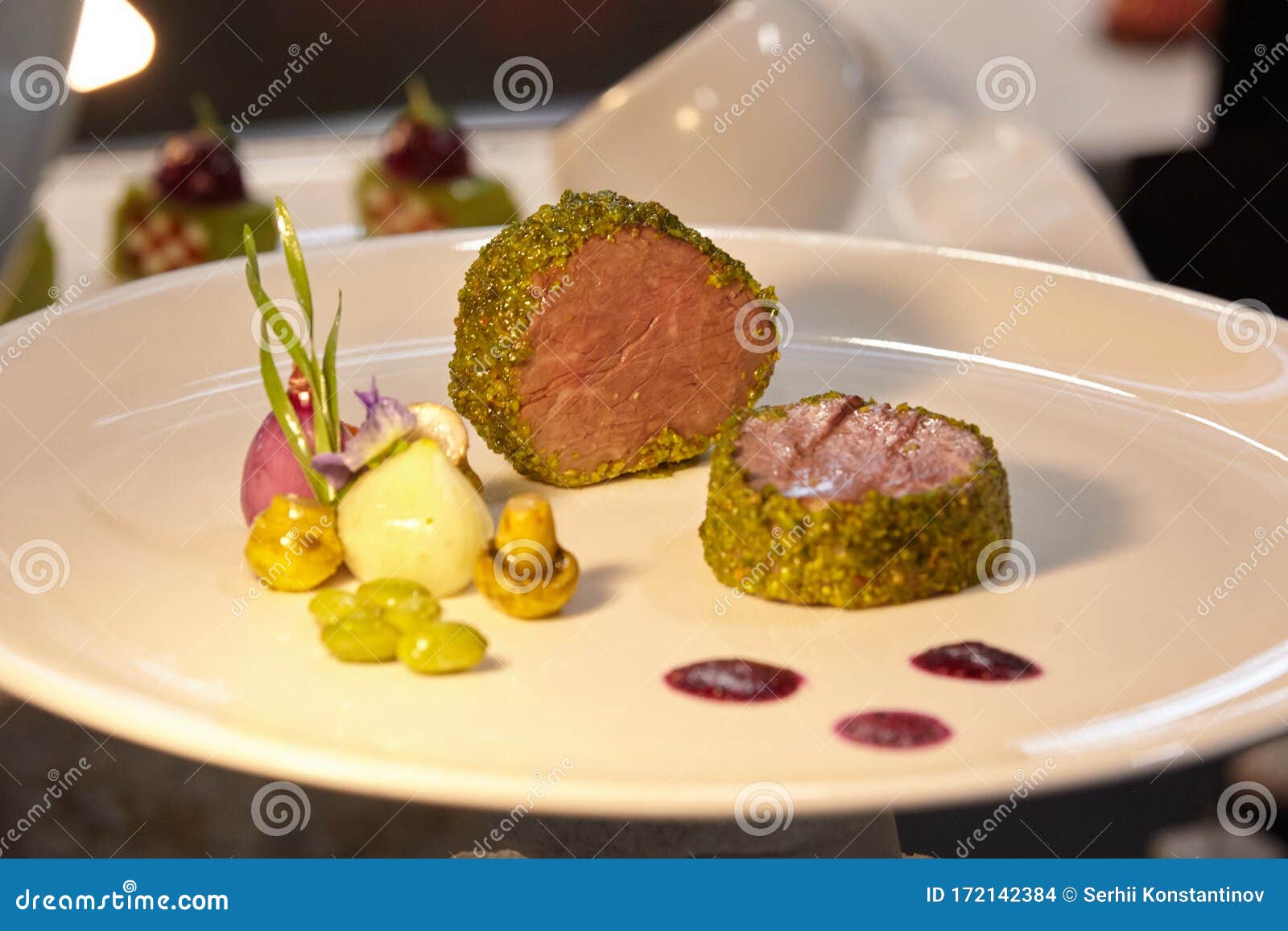 Veal Medallion in Sauce with Glazed Vegetables on a Plate Stock Photo ...