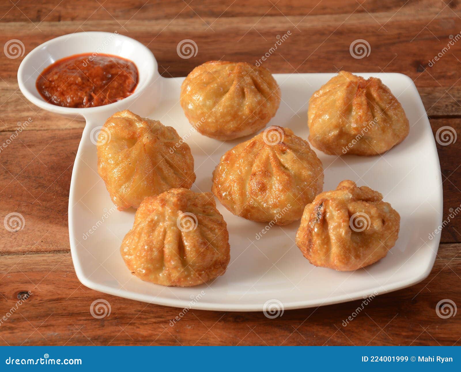 Veg Fried Momo with Sauce Served Over a Rustic Wooden Background ...
