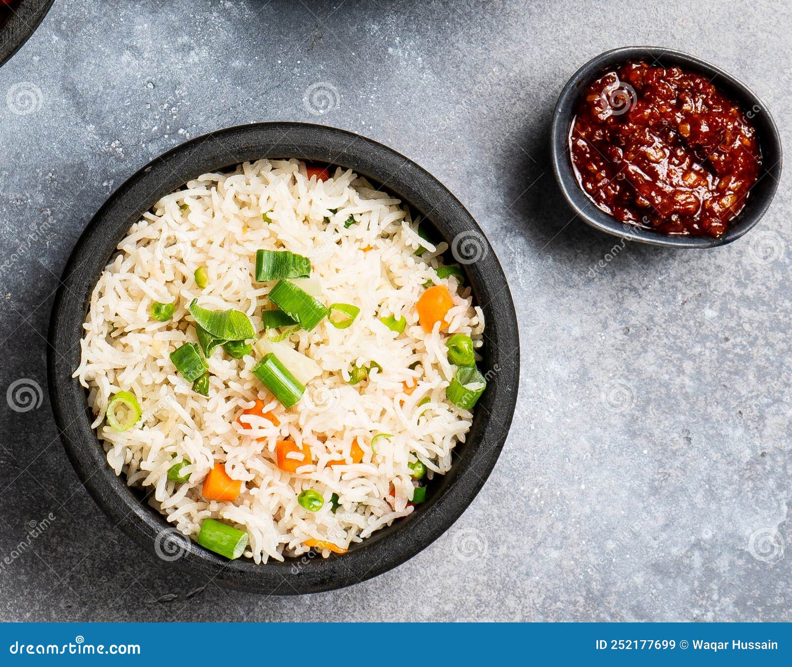 Vegan Fried Rice Served in a Dish Isolated on Dark Background Top View ...