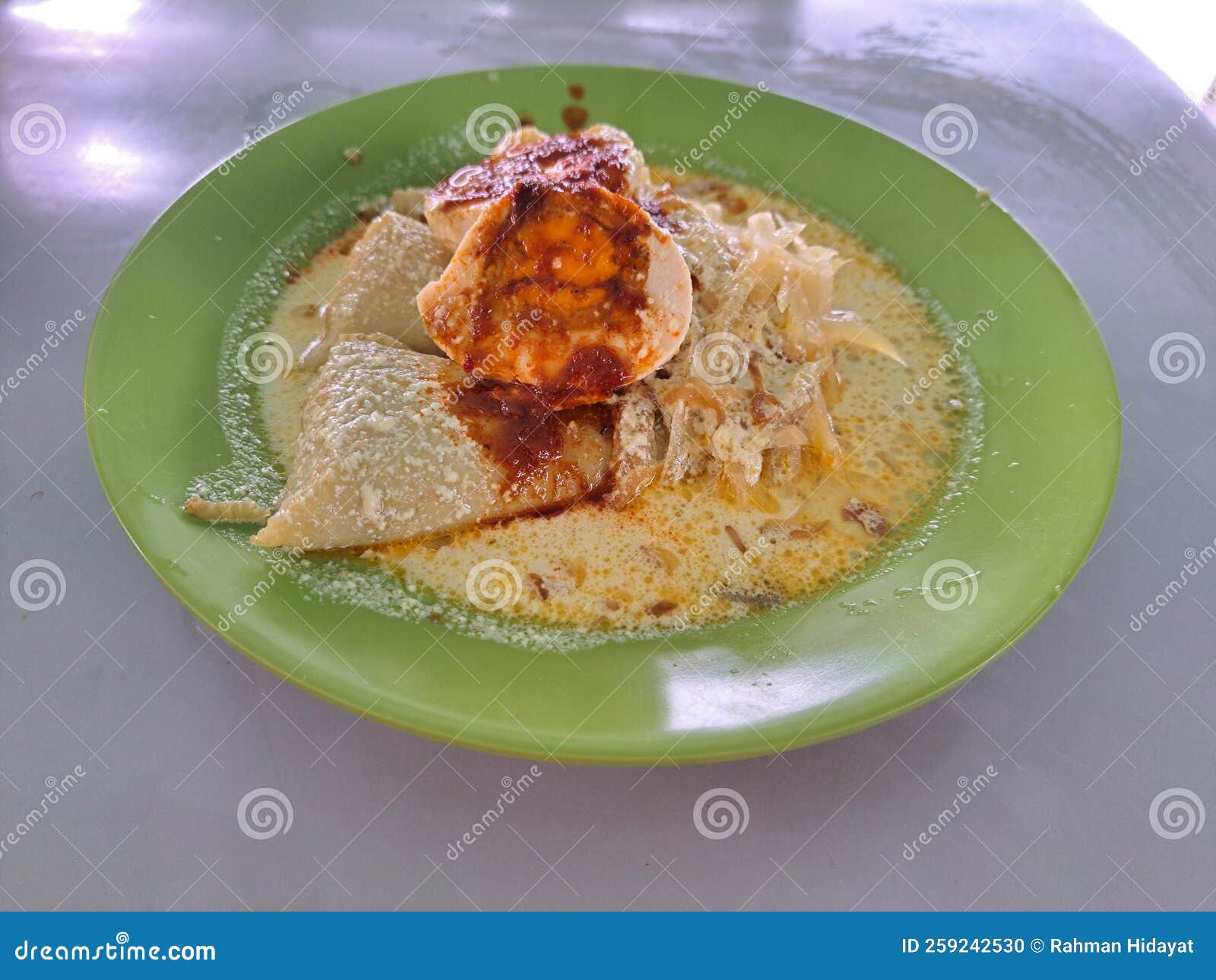 Vegetable Lontong with Coconut Milk Sauce with Salted Egg Side Dish ...