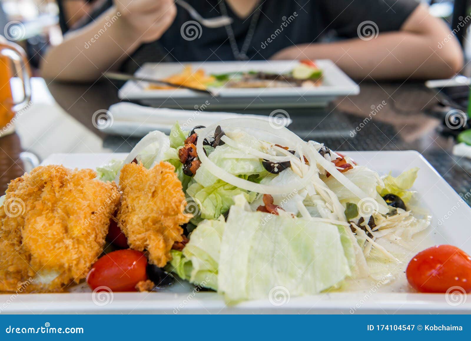 Vegetable Salad with Breaded Fried Fish Stock Image - Image of leaf ...