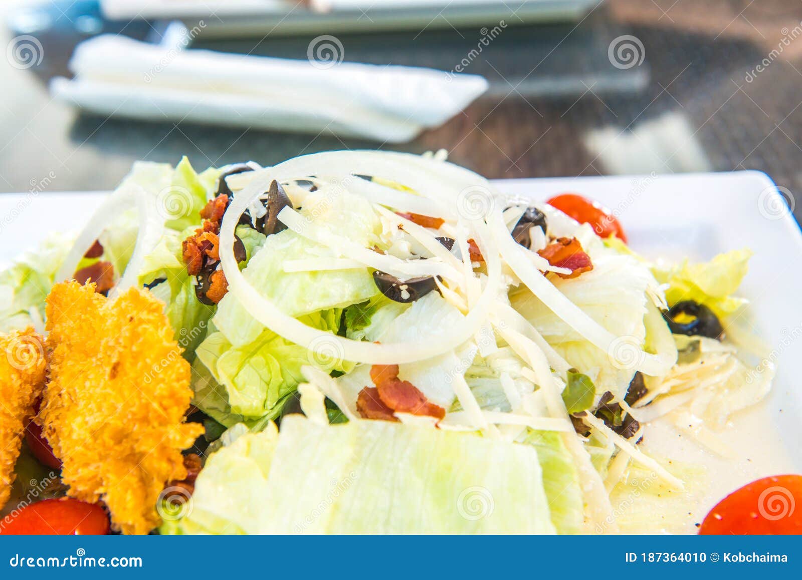 Vegetable Salad with Breaded Fried Fish Stock Photo - Image of crispy ...