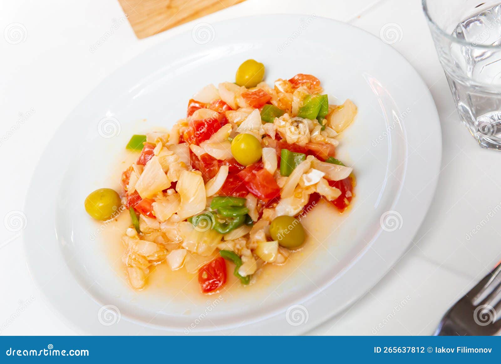 Vegetable salad with cod stock photo. Image of dish - 265637812