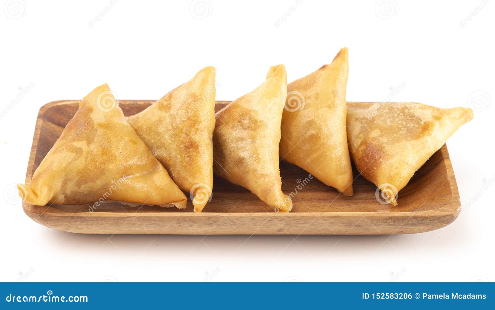 Vegetable Samosas on a White Background Stock Photo - Image of side ...