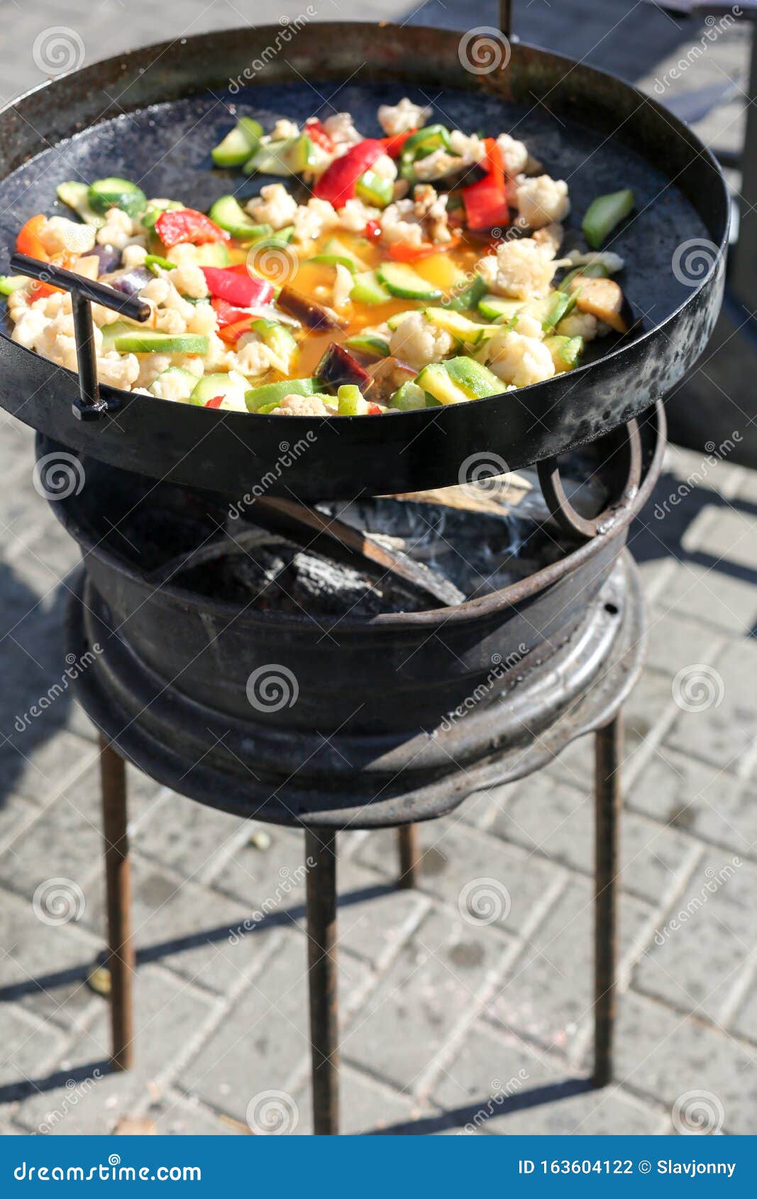 Vegetable Stew in an Iron Cauldron Languishes on the Fire Stock Photo ...