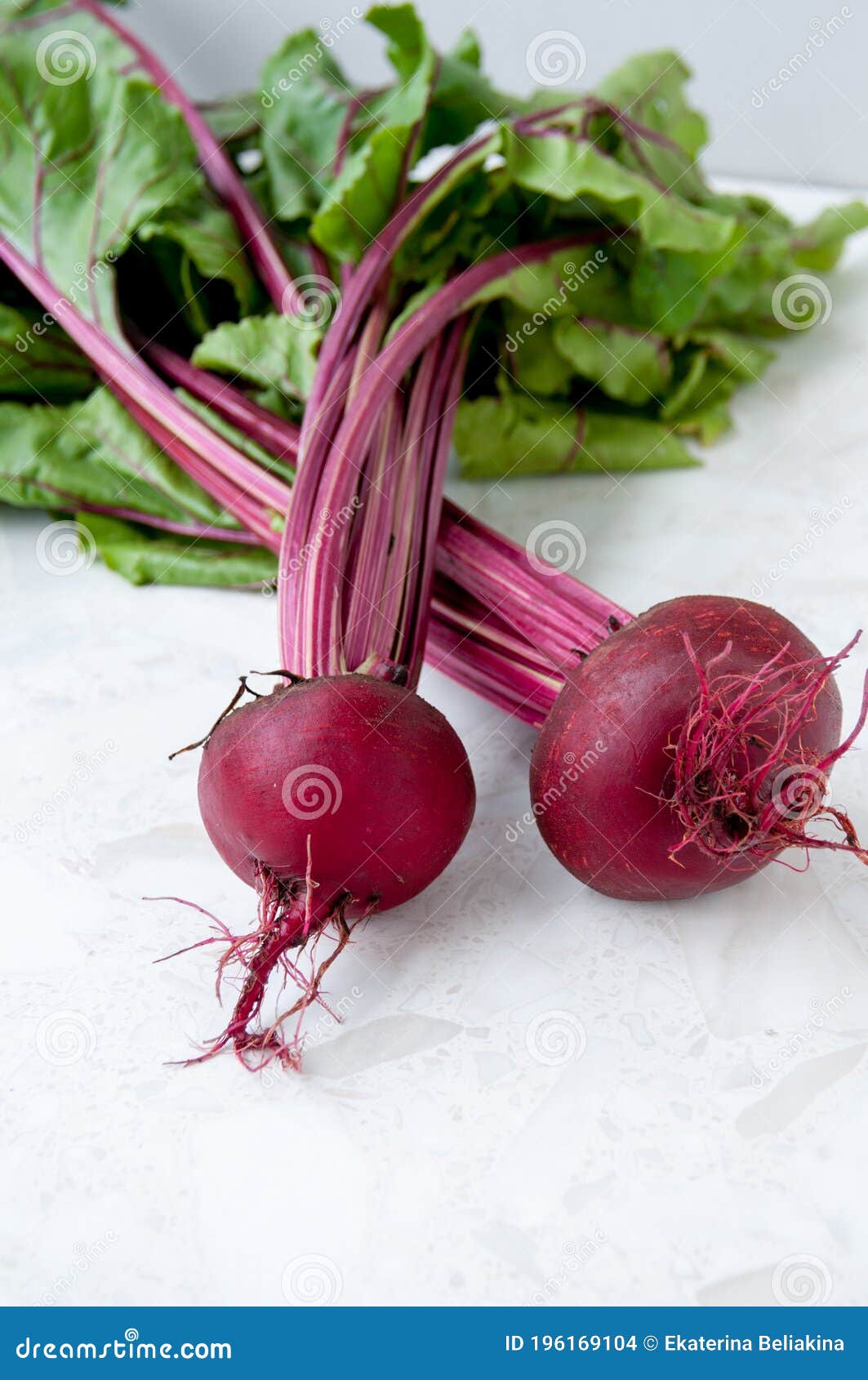 Vegetable Still Life: Two Beets with Tops on the Table Stock Photo ...