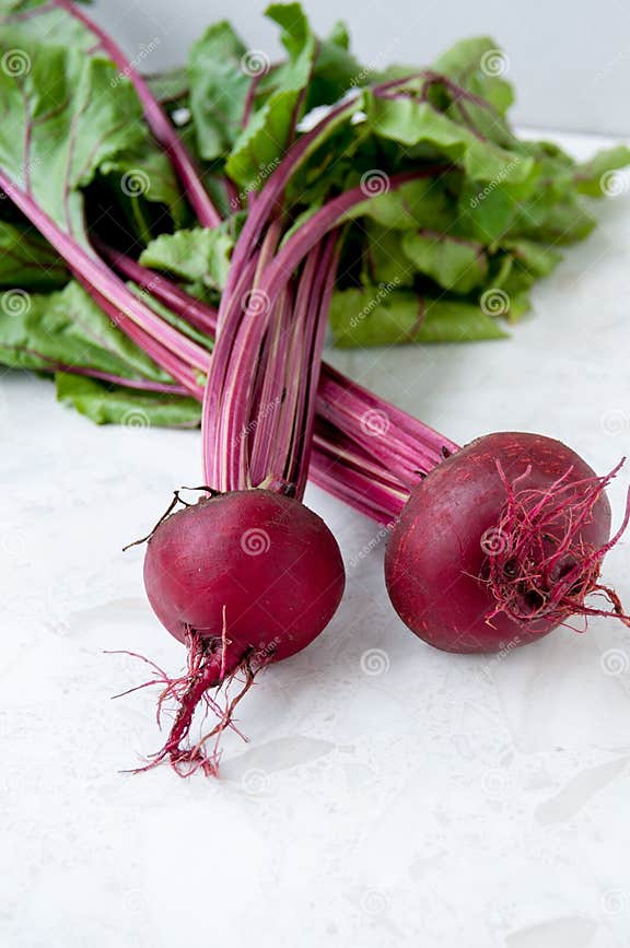 Vegetable Still Life: Two Beets with Tops on the Table Stock Photo ...