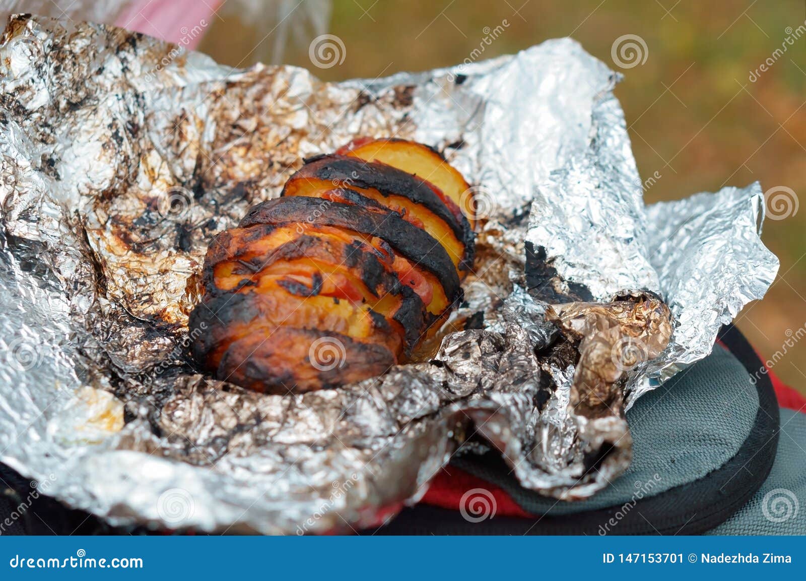 Vegetables Baked in Foil on Fire, Baked Potatoes Stock Image - Image of ...