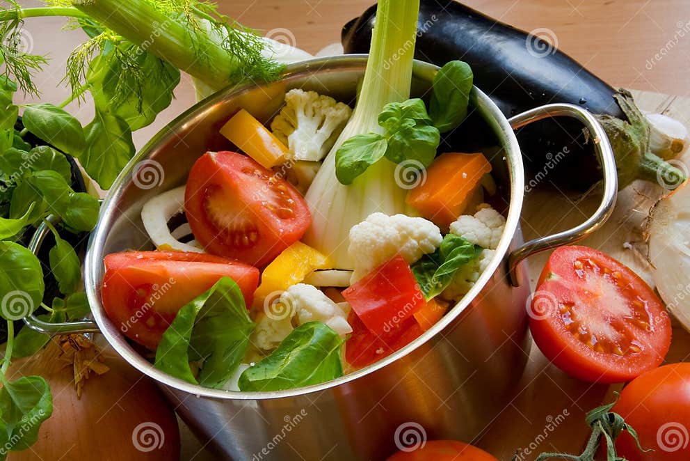 Vegetables in cooking pot stock photo. Image of herbs - 8452606