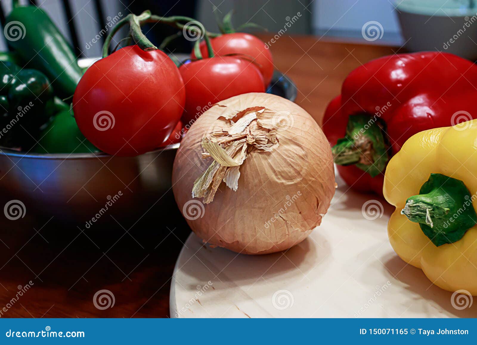 Vegetables and Cutting Board Sit on Table in Kitchen Stock Image ...