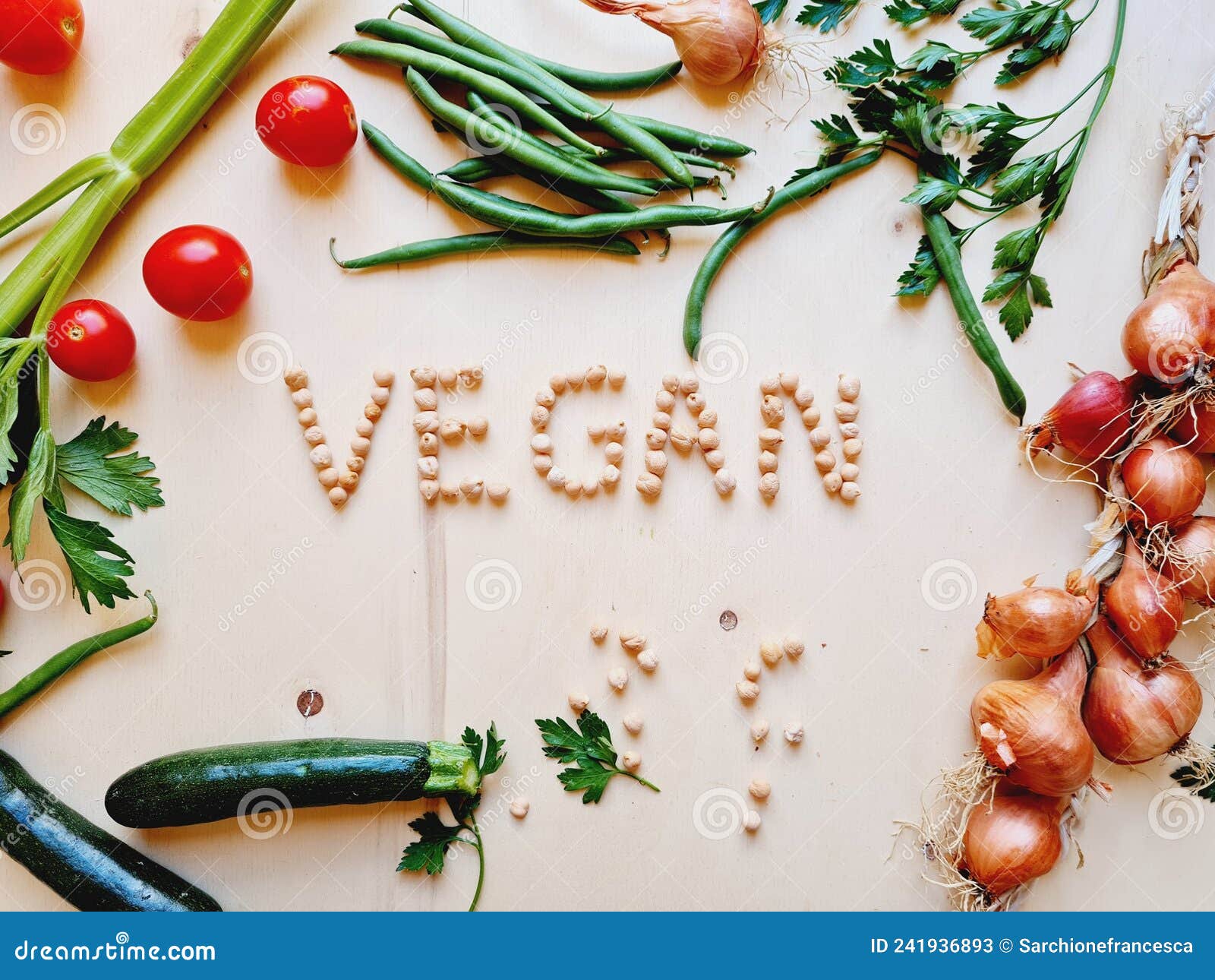 Vegetables Placed on the Table in the Kitchen and Written Vegan Made ...
