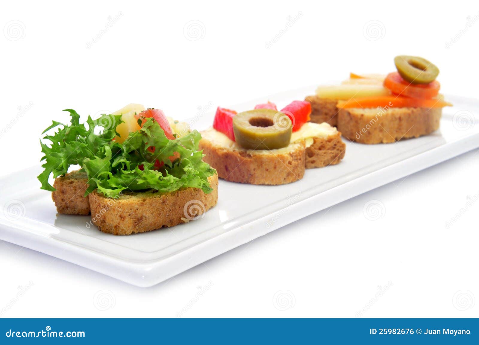 Vegetarian Canapes From Polenta With Cheese, Vegetables And Cress On A ...