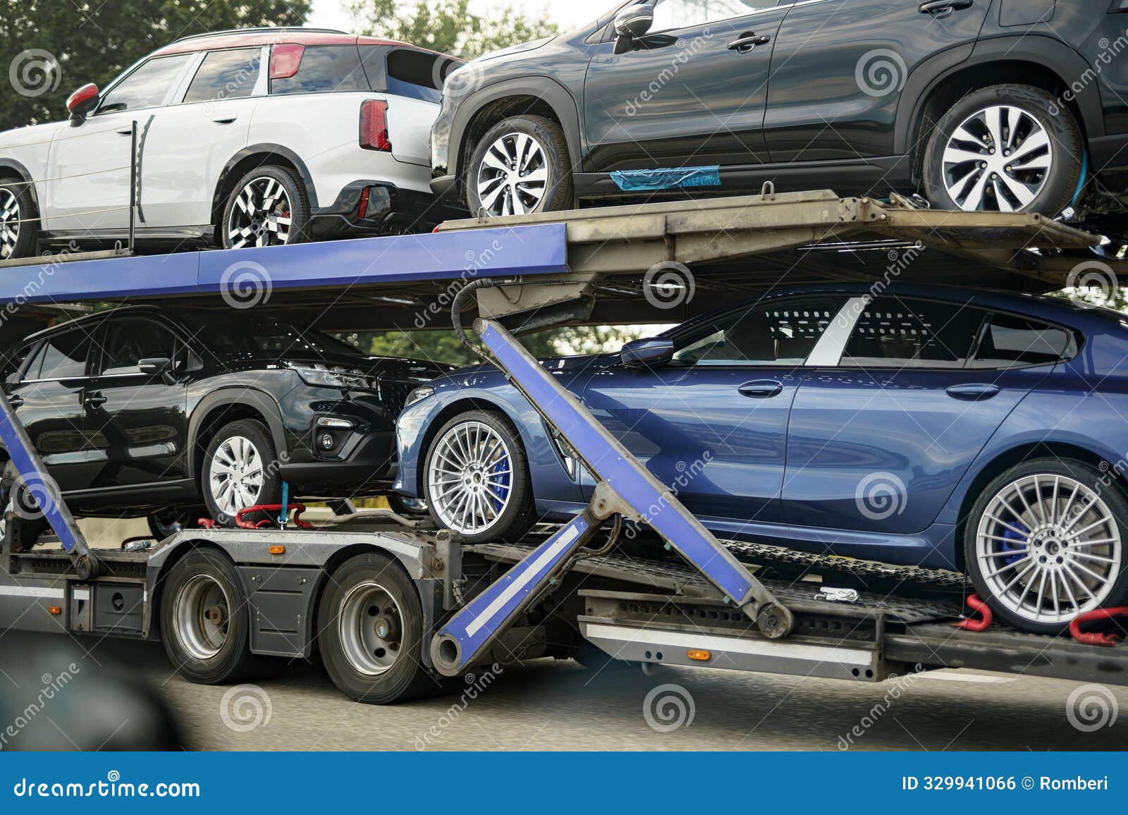 A Vehicle with Cars for Transporting Cars on a Motorway Stock Photo ...