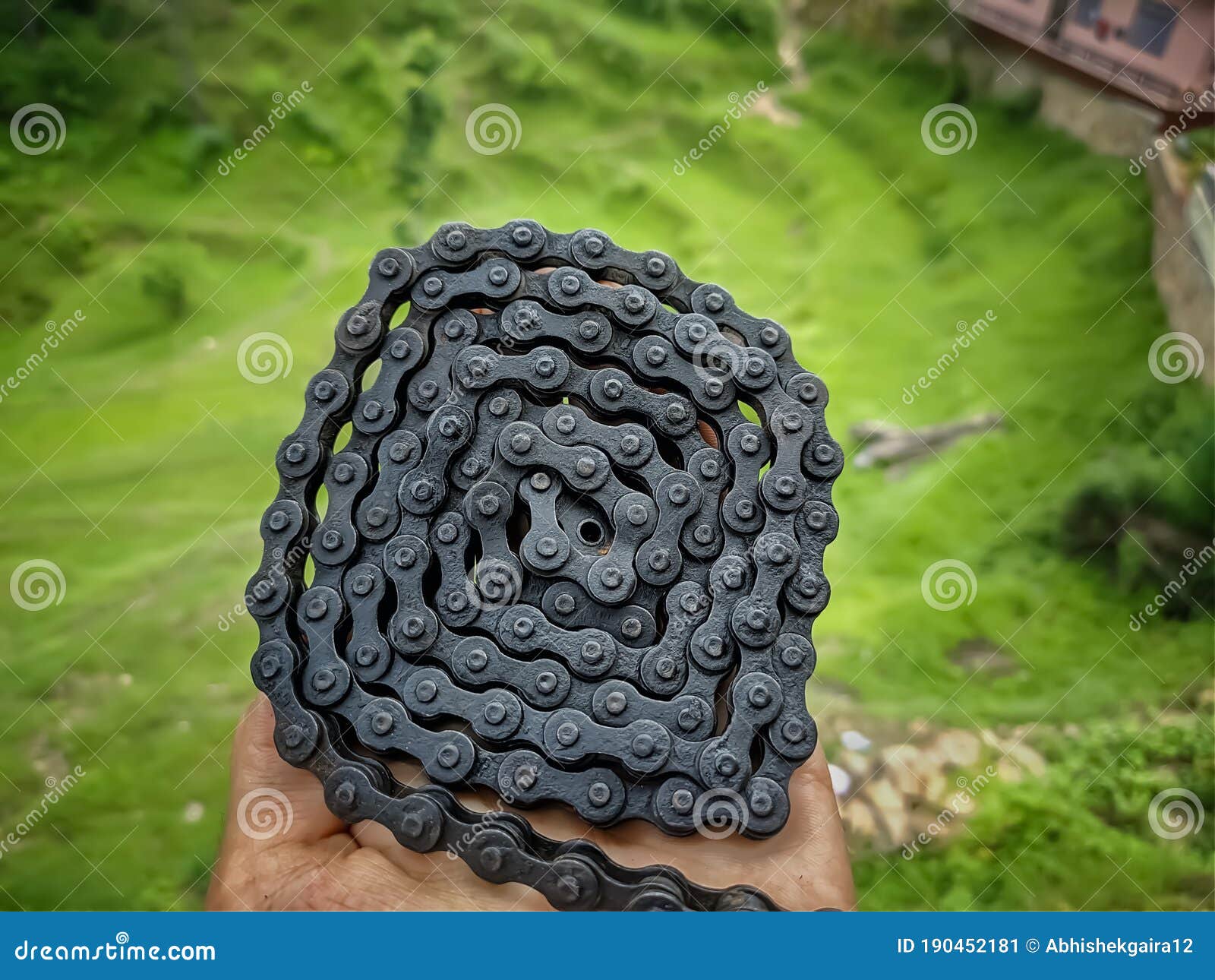 A vehicle chain on hand. stock image. Image of head - 190452181
