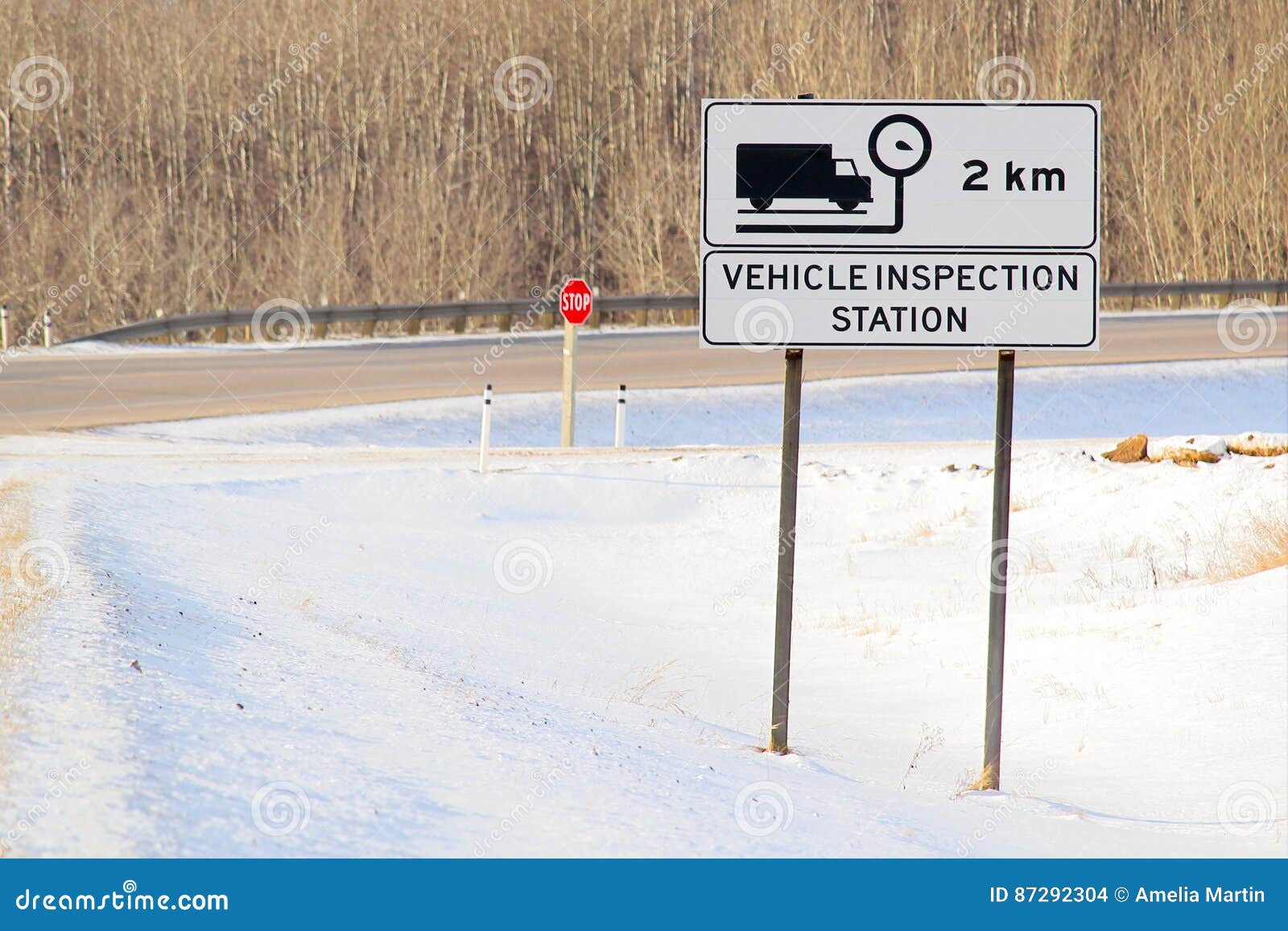 Vehicle Inspection Ahead Sign with Highway in the Background Stock ...