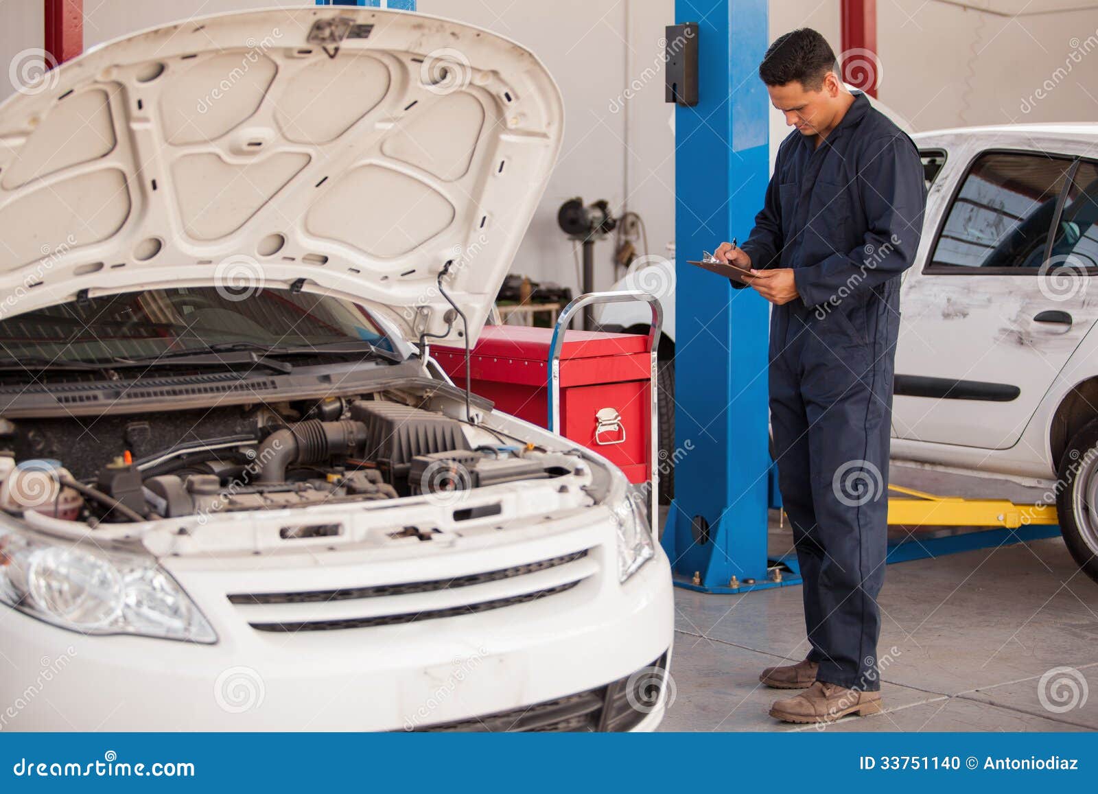 Vehicle Inspection at an Auto Shop Stock Photo - Image of motor ...
