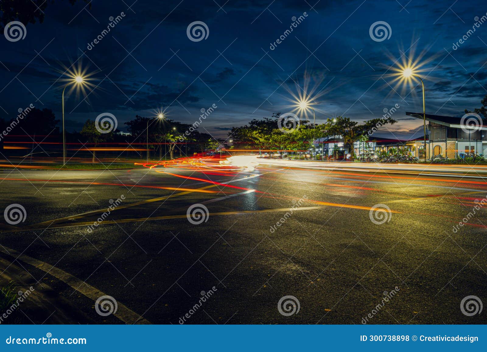 The Vehicle Light Trails in Motion on a Cloudy Evening Stock Photo ...