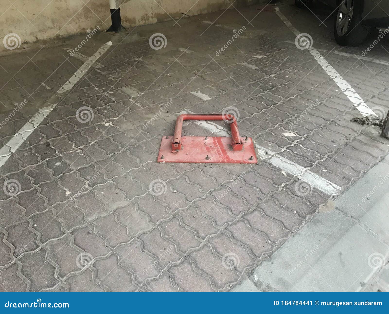 Car Parking Stopper From Concrete With Green And Yellow Color. Stock ...