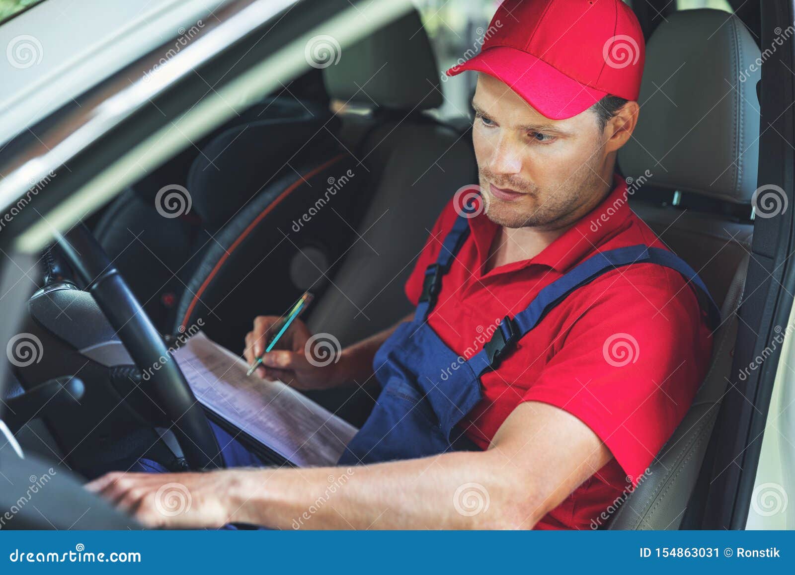 Vehicle Technical Inspection - Man Sitting Inside The Car And Checking ...