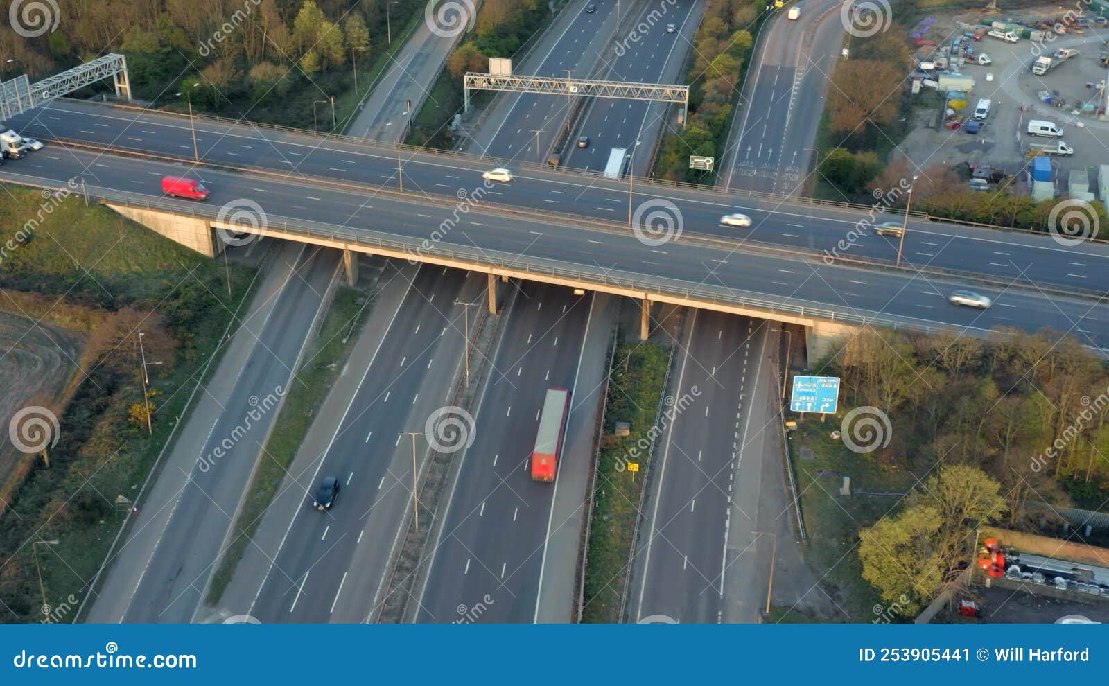Vehicles Driving on a Freeway at Sunset Using the Junction and Bridges ...