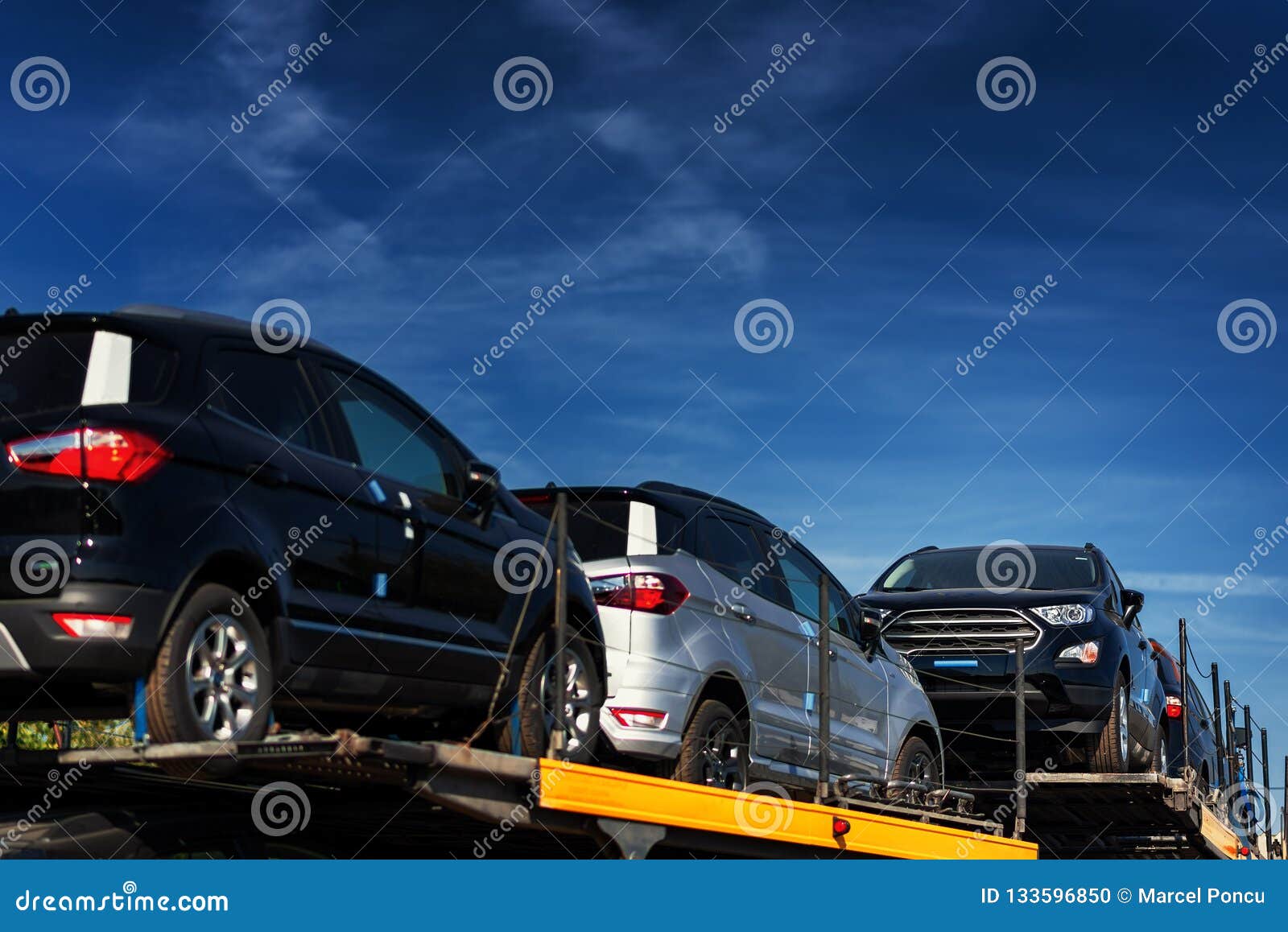 Vehicles Loaded and Ready for Delivery Dealership Stock Photo - Image ...