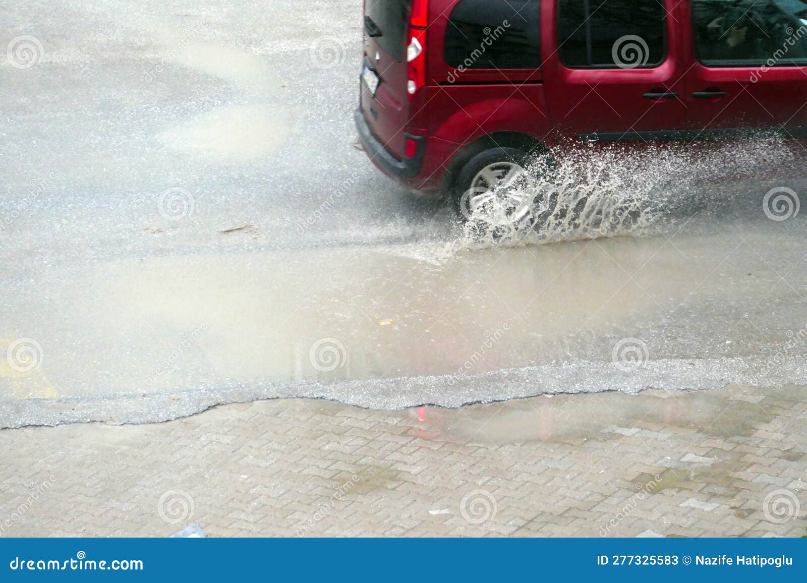 Vehicles Speeding through Puddles Splash Water Stock Image - Image of ...