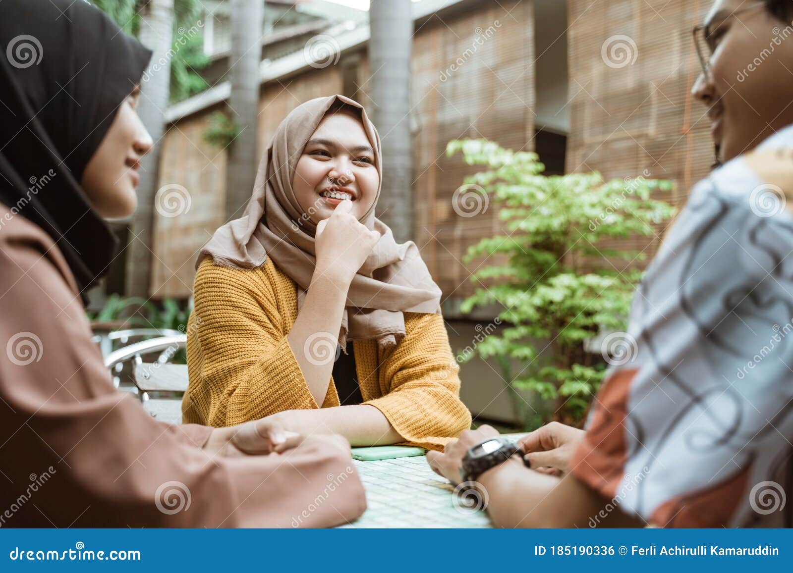 Veiled Female Students Smile while Chatting Stock Photo - Image of cool ...