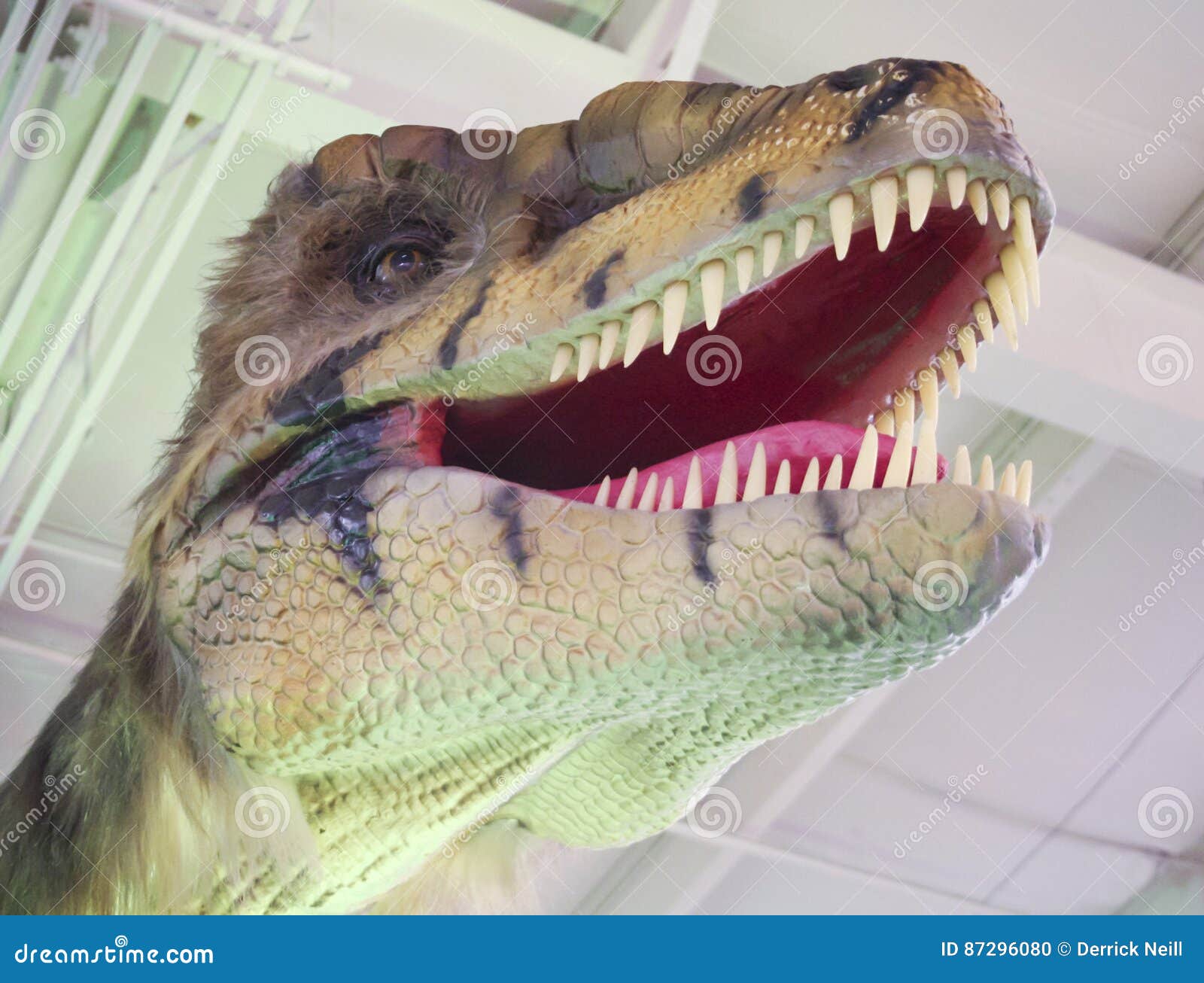 Feathered Velociraptor With Open Mouth In Jurassic Land With Volcano In ...