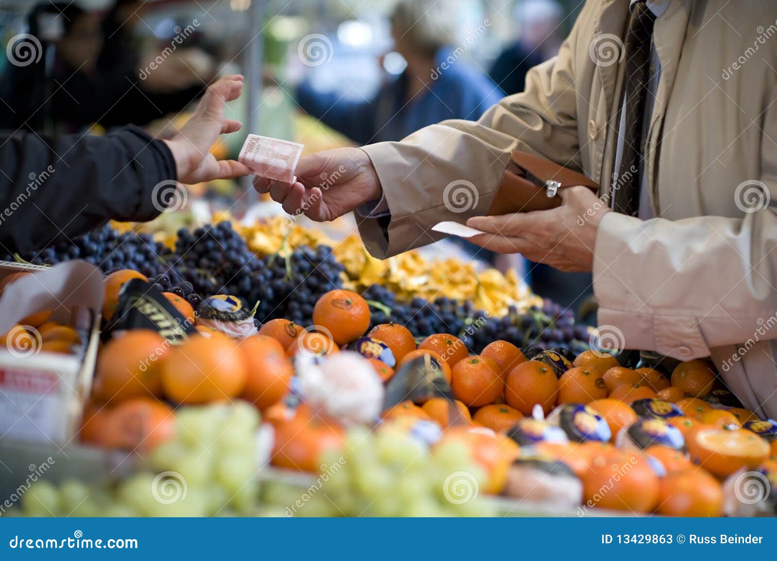 Vendor Accepts Payment at a Street Market Stock Image - Image of ...