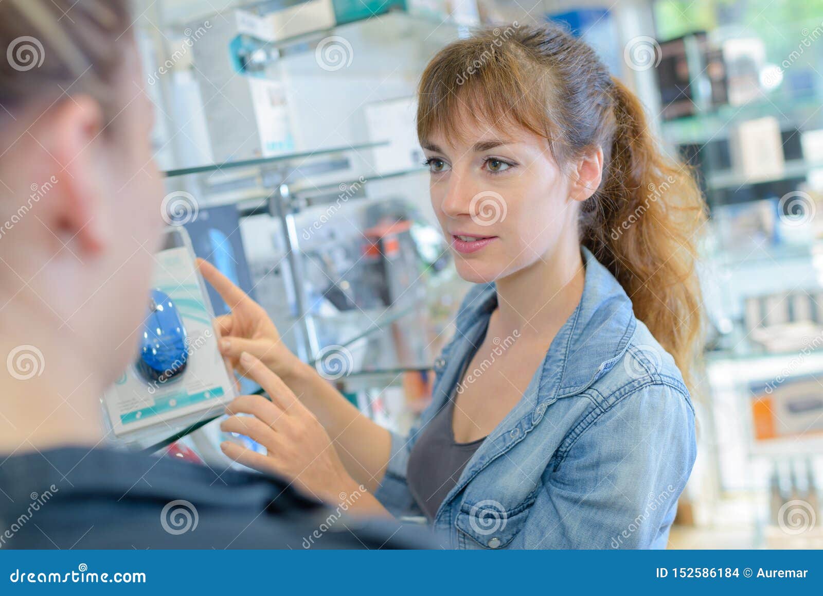 Vendor Showing Computer Mouse To Customer Stock Photo - Image of tool ...