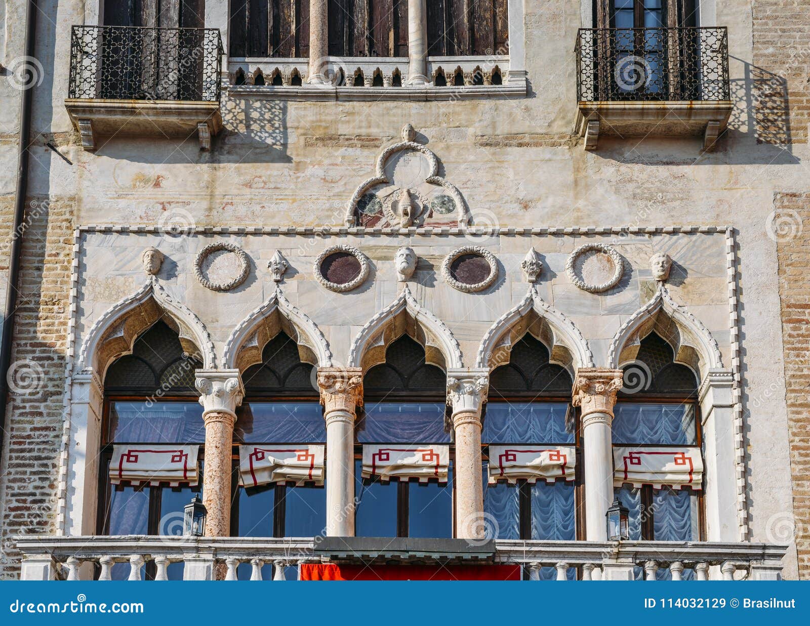 Venetian Style Windows on Building Facade. Stock Image - Image of ...