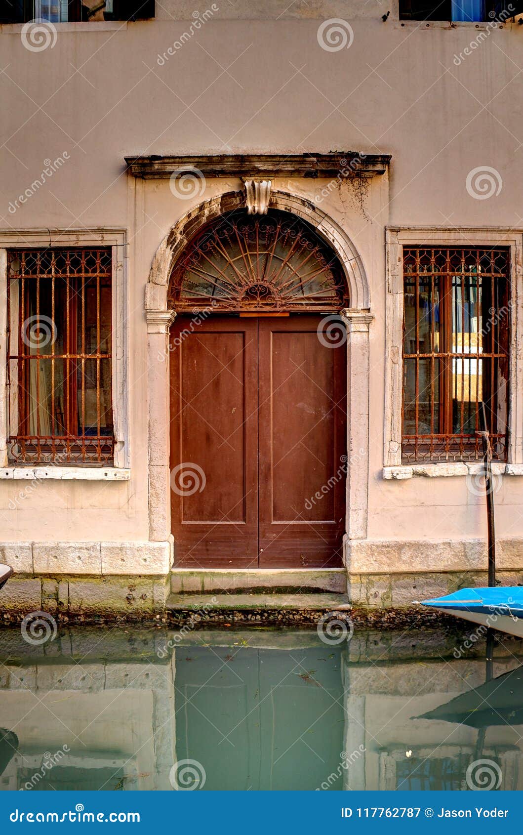 Venice Door with Canal stock image. Image of security - 117762787