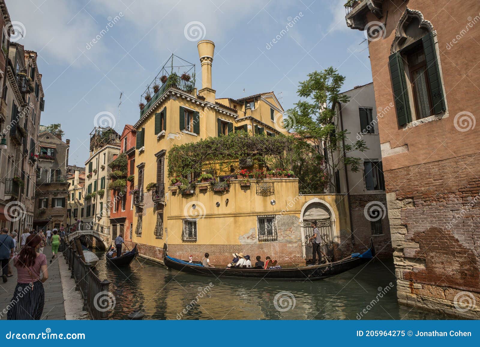 Couples Take A Ride On A Gondola That Is Navigating On One Of The Many