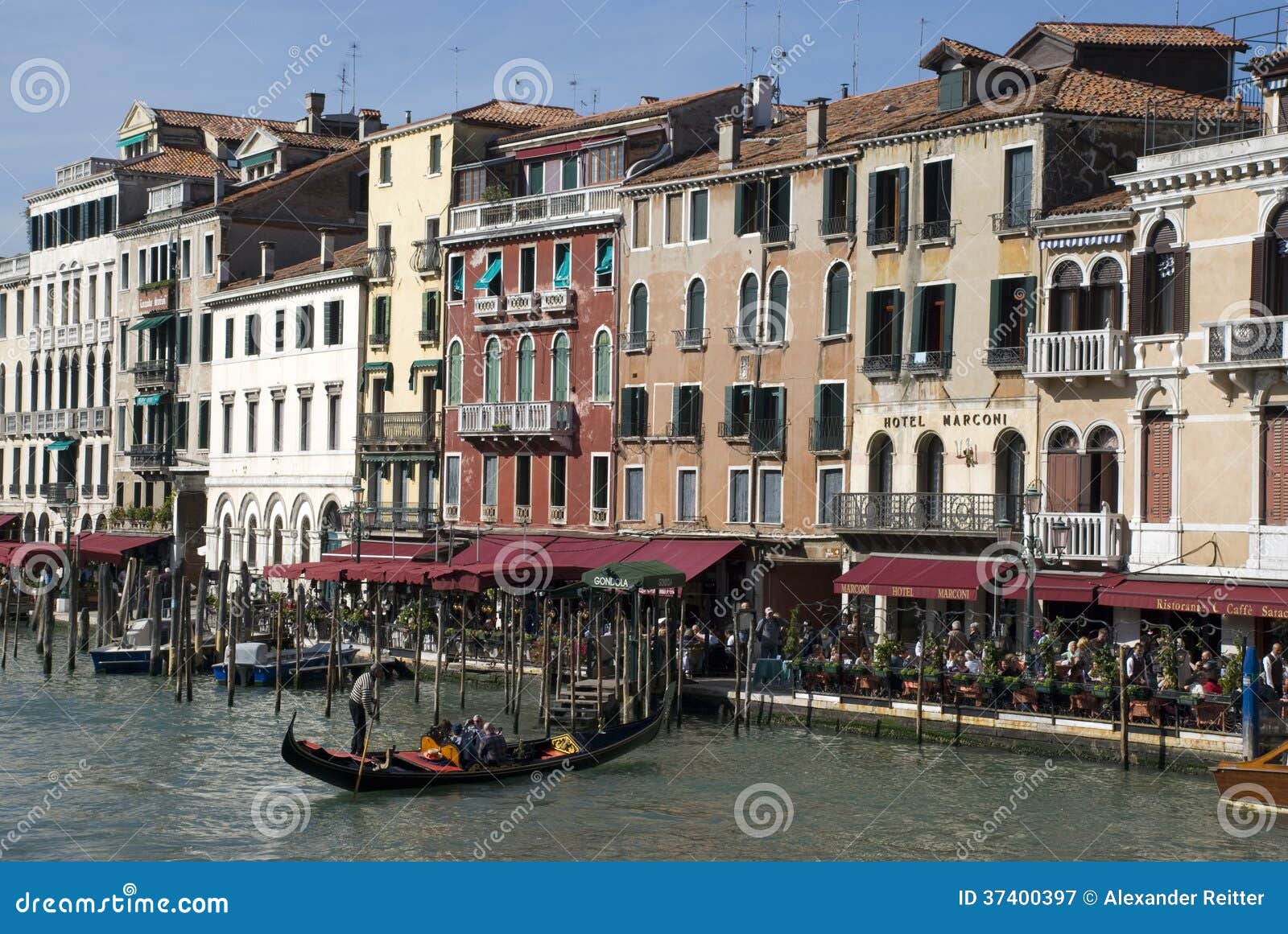 Venice Waterfront with Gondola Near Rialto Editorial Photography ...