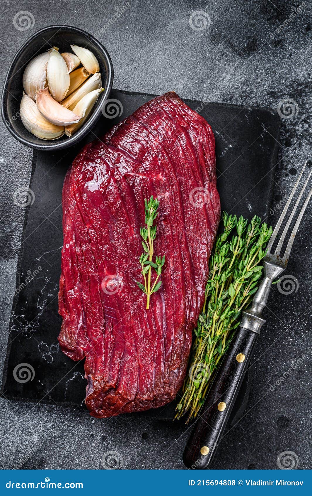 Venison Raw Steak from Wild Meat. Black Background Stock Photo - Image ...
