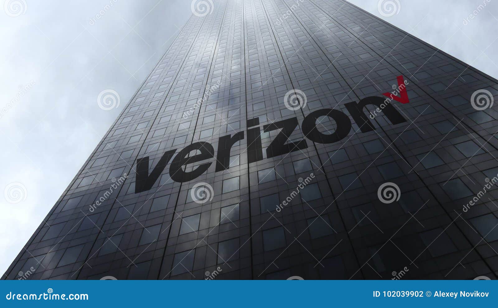 Verizon Communications Logo on a Skyscraper Facade Reflecting Clouds ...