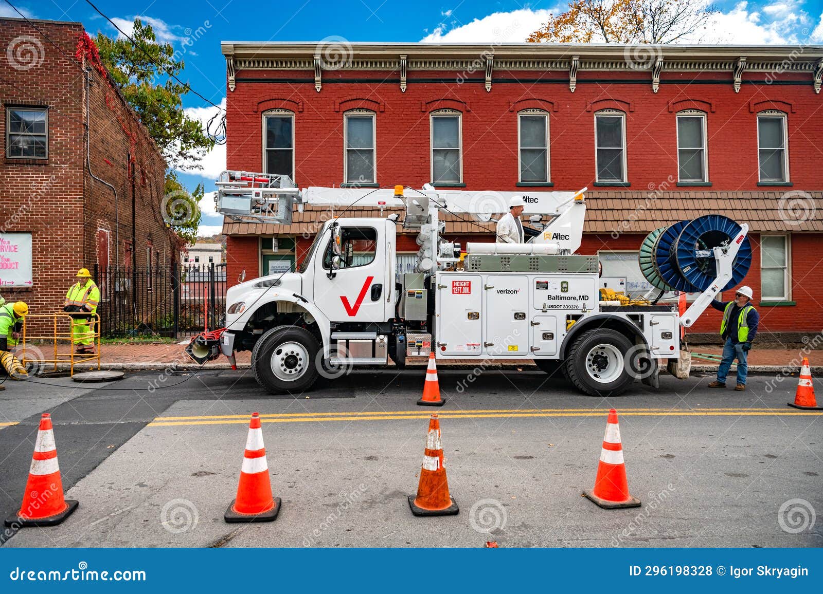 Verizon Workmen Lowering Cable into a Manhole (digital Composite ...