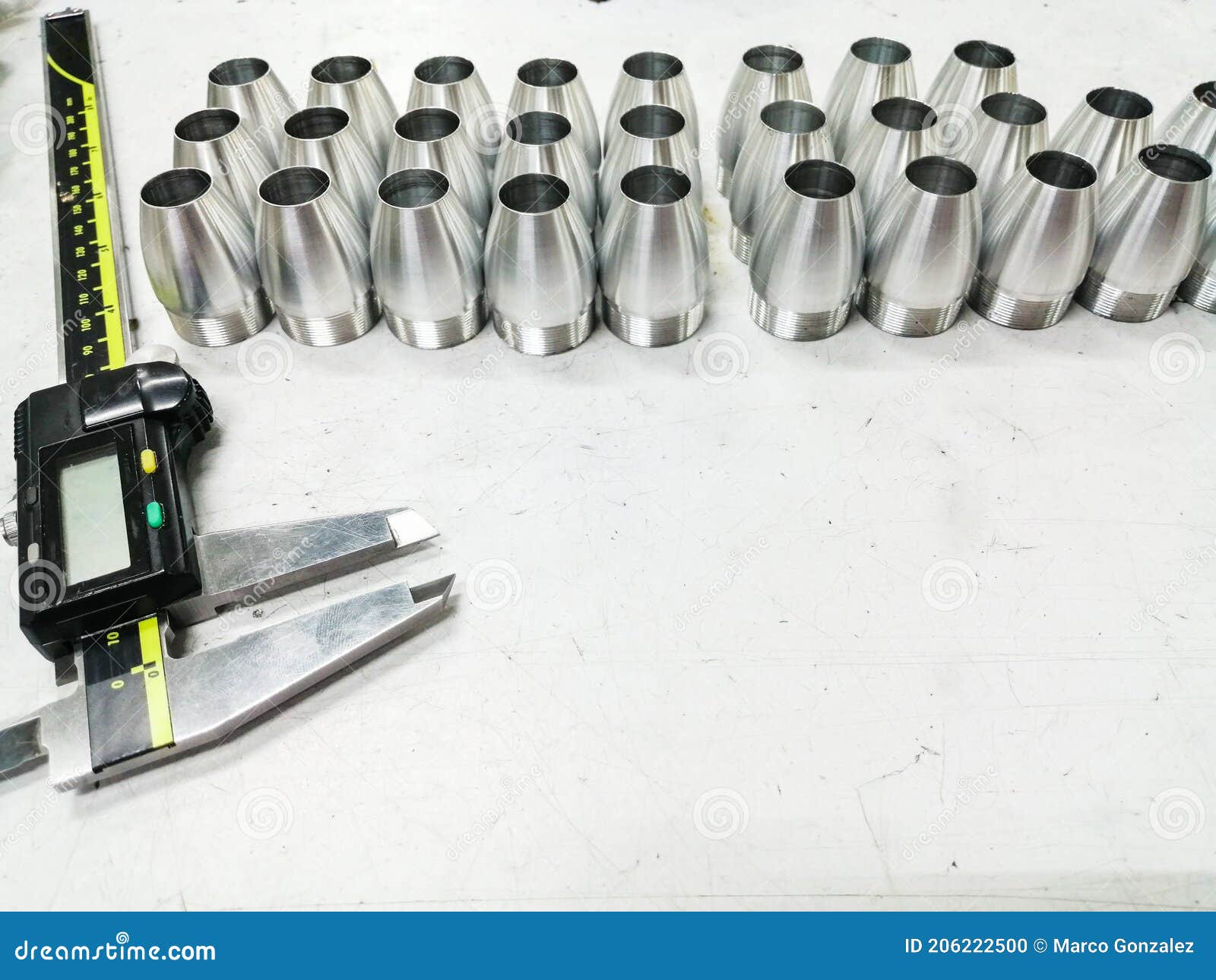 Vernier Caliper and Some Aluminum Pieces on a White Table Stock Photo ...