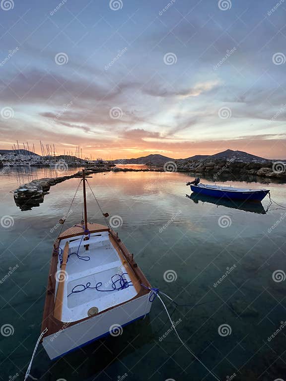 A Soft Greek Sunset in Naousa Harbor in Paros, Greece Stock Image ...