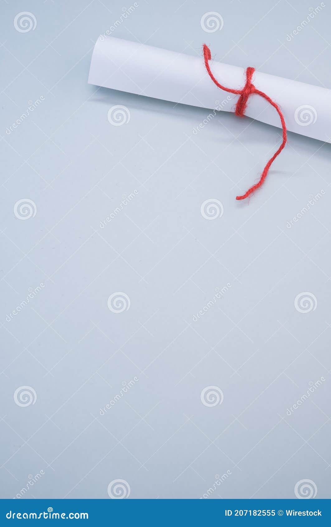 Vertica Shot of a White Paper Scroll Tied with Red Thread Isolated on a ...