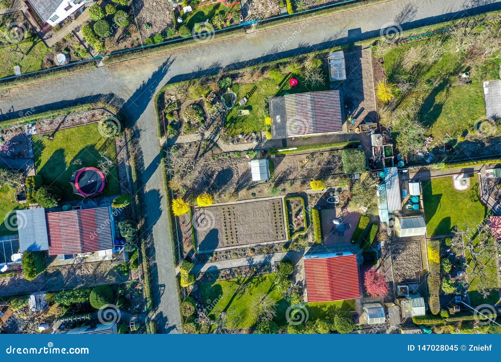 Vertical Aerial View of an Allotment Garden with Huts, Garden and Paths ...