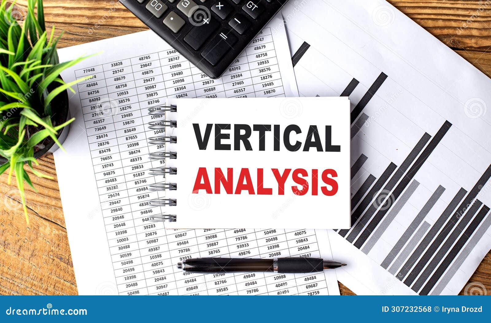 VERTICAL ANALYSIS Text on a Notebook with Chart and Calculator Stock ...