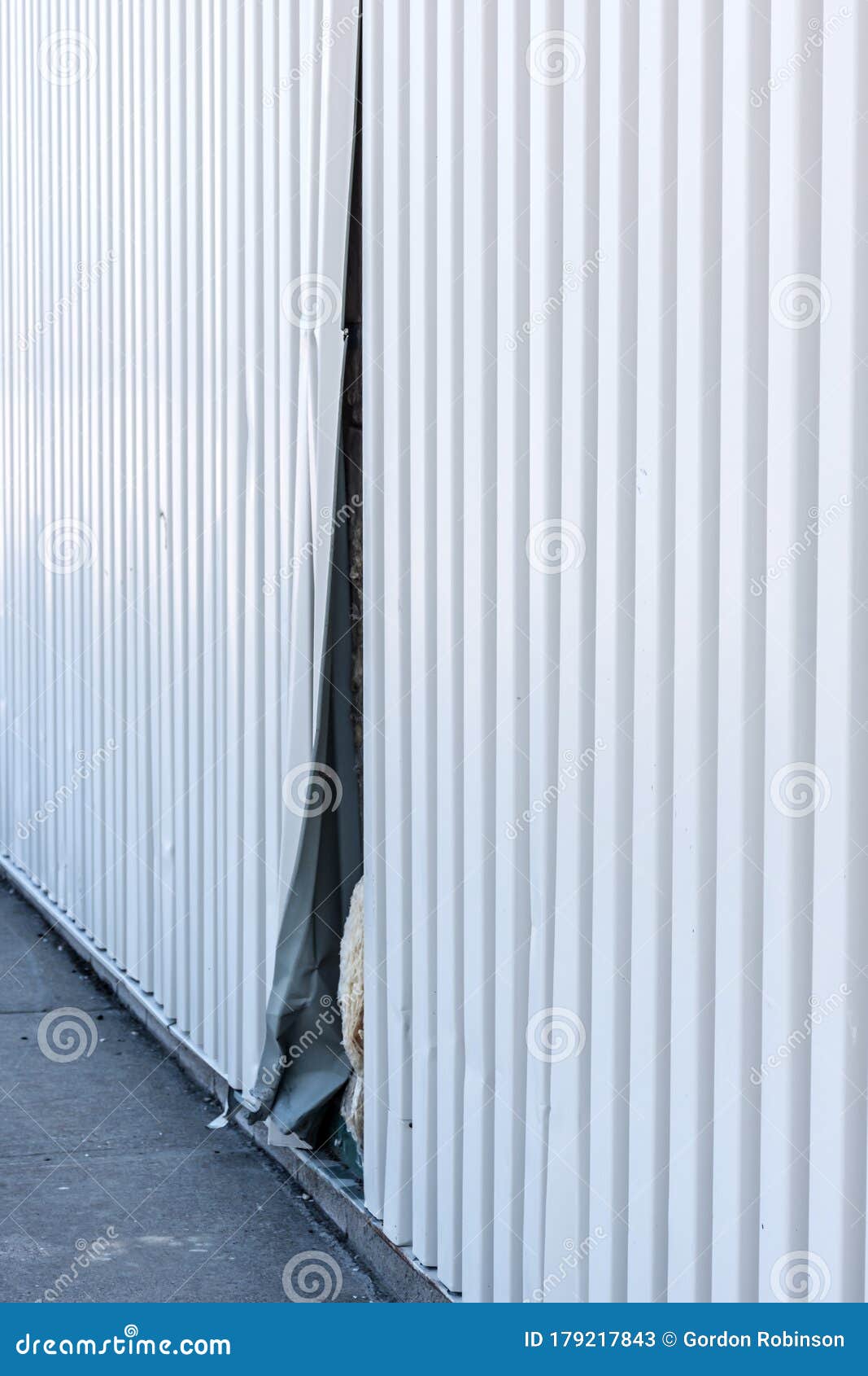 Damaged Wall with Torn Panel Sticking Out. Stock Image - Image of cream ...