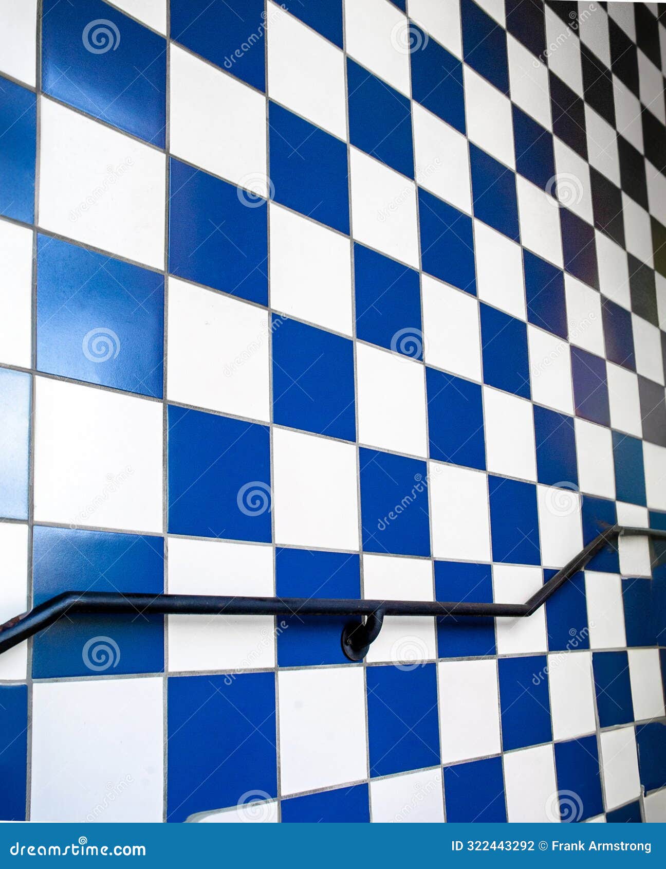 Vertical Angled Image of a Blue and White Checkered Wall with a Black ...