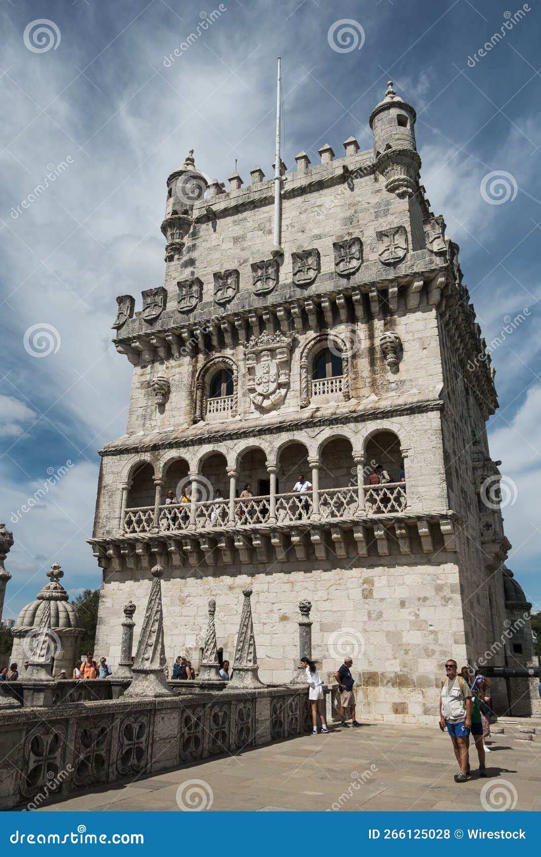 Vertical of Belem Tower with a Seascape View with a Cloudy, Sunlit Sky ...